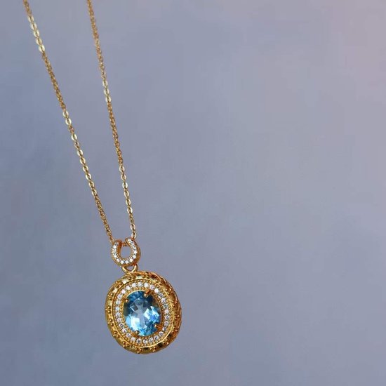 Blauwe Topaas Ovale Hanger met Gouden Omlijsting – Met Ketting | bol