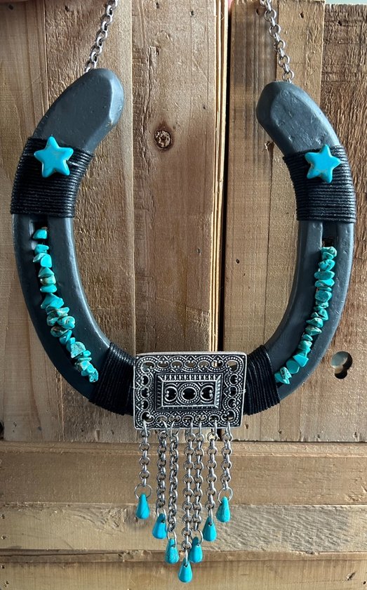 Decoratief hoefijzer met turquoise accenten om geluk te brengen in je ...