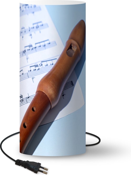 Lampe Instruments sur partition - Flûte à bec marron sur partition ...