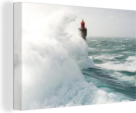 Canvas Schilderij Een hoge golf voor de Vuurtoren van la Jument in Frankrijk - 60x40... | bol.com