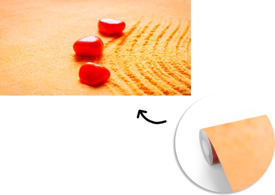 Behang - Fotobehang Zen beeld van rode stenen in het zand - Breedte 500 ...