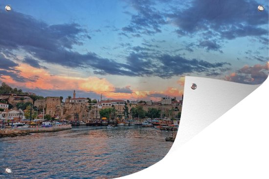 Muurdecoratie De zon gaat onder achter de oude stad Antalya in Turkije ...